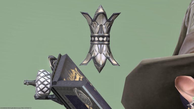 A book that looks like a silver accessory with a hole / The Scholar ...