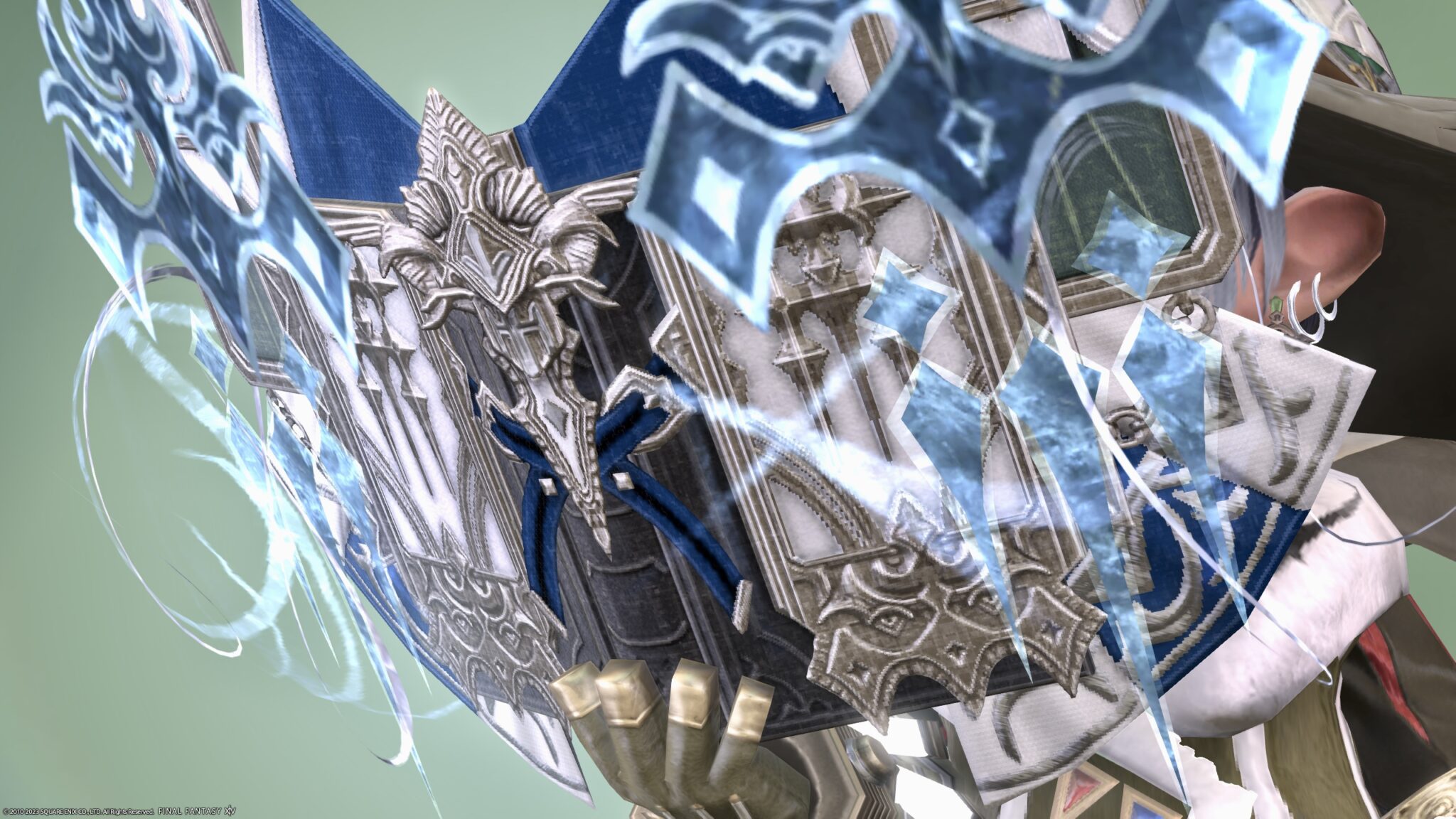 Scholar’s Manderville Weapon Stage 2: A shining book with a noble crest ...