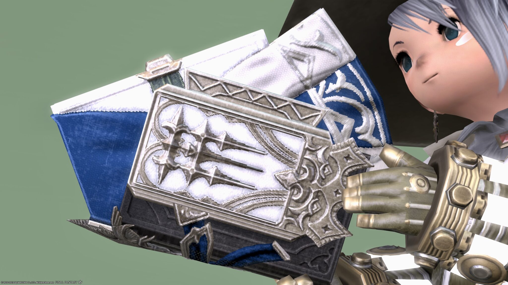 Scholar’s Manderville Weapon Stage 2: A shining book with a noble crest ...