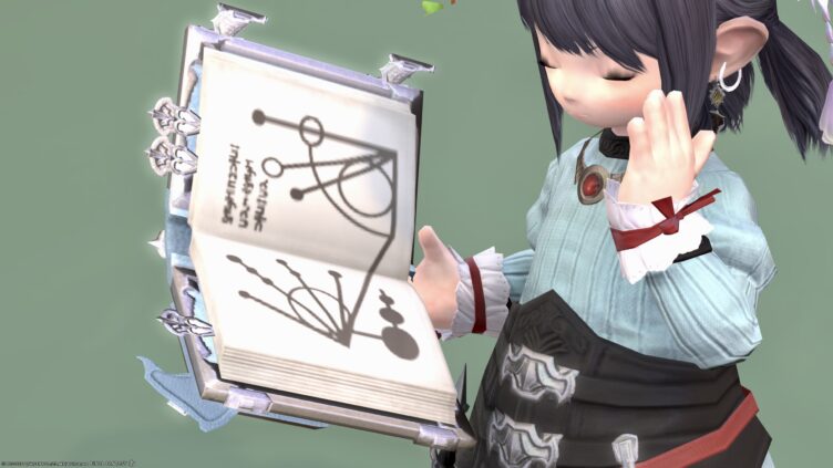 A light blue book with a cute silver bookmark / Summoner’s weapon ...